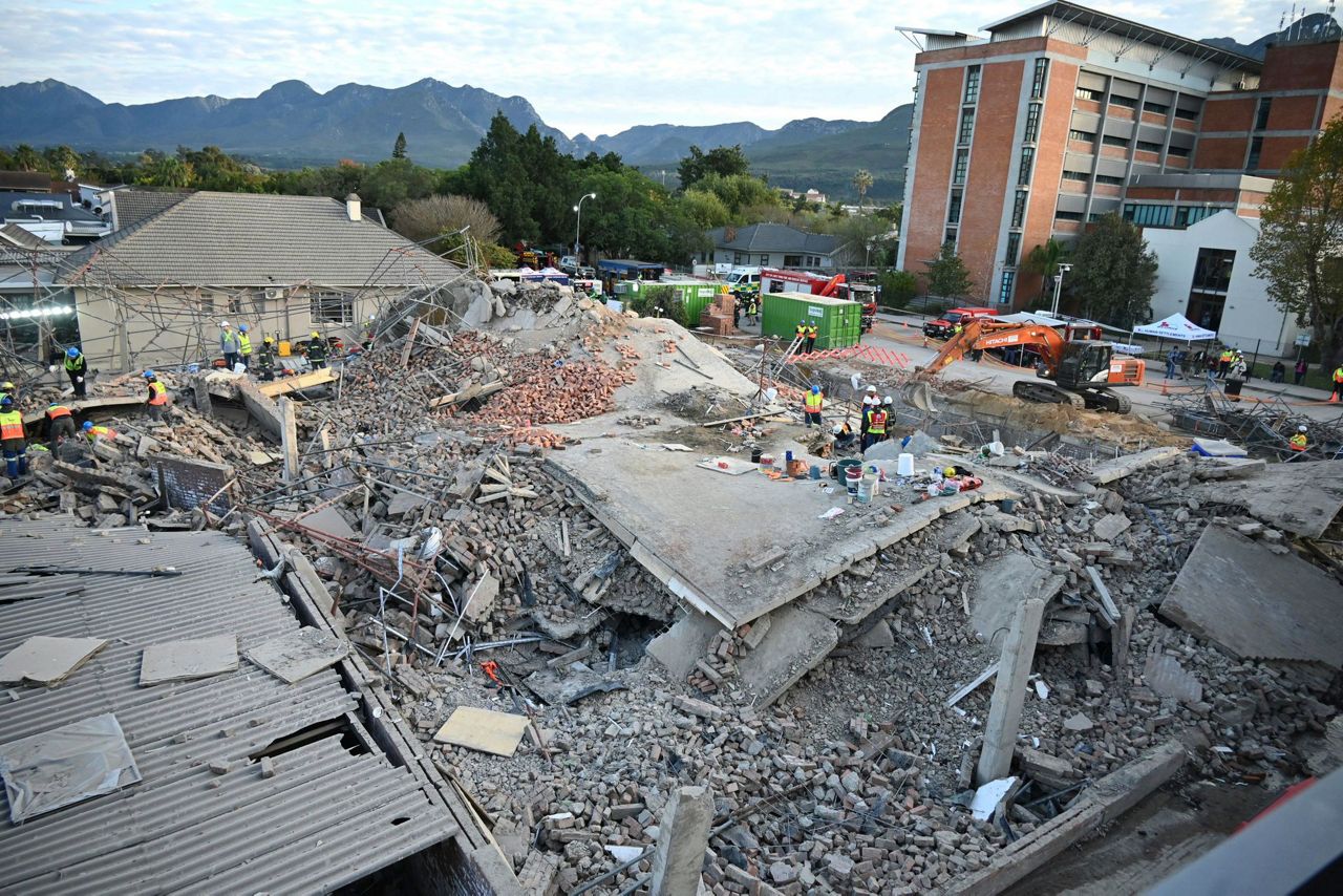 Rescue effort for dozens missing in South Africa building collapse are boosted by 1 more survivor