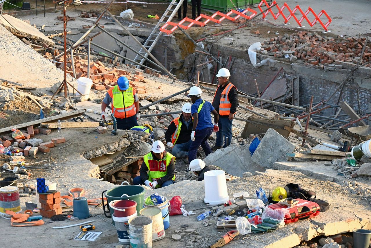 5 workers dead, 49 still missing after a building under construction ...
