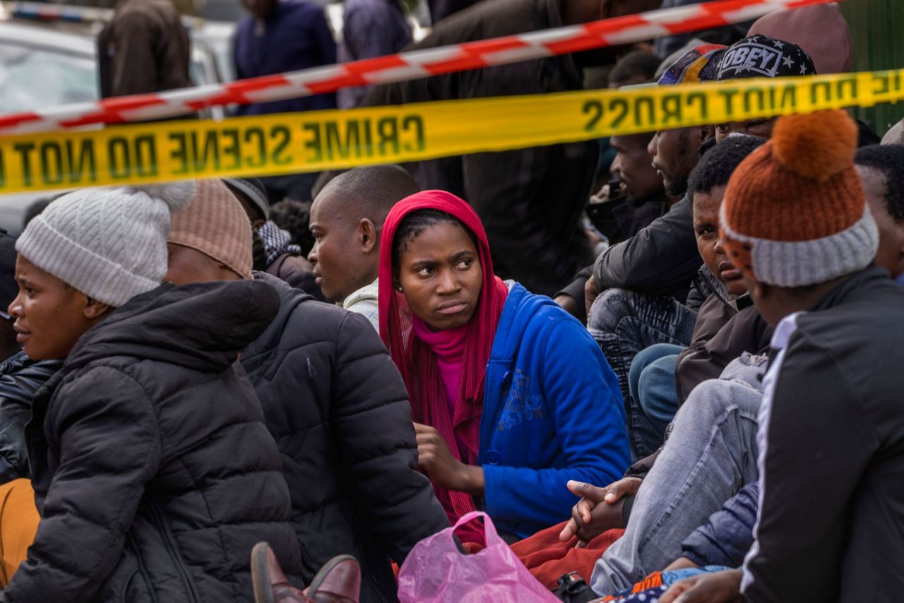 Emergency services leave South Africa fire scene. Now comes the grisly ...