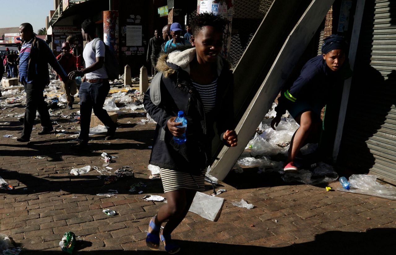 South African police arrest 90 as unrest in cities continues