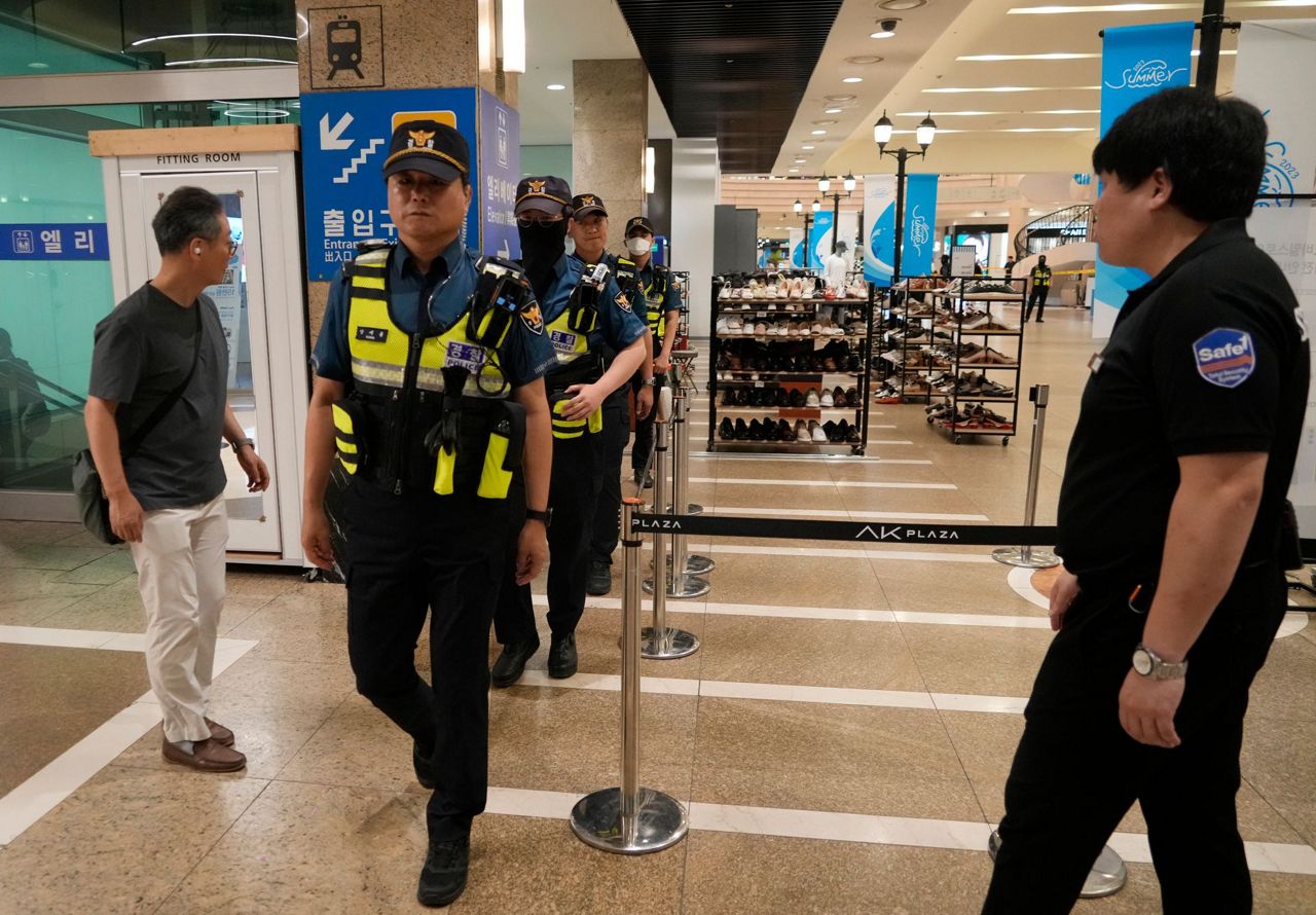 13 injured in South Korea when a man rams a car onto a sidewalk, stabs ...