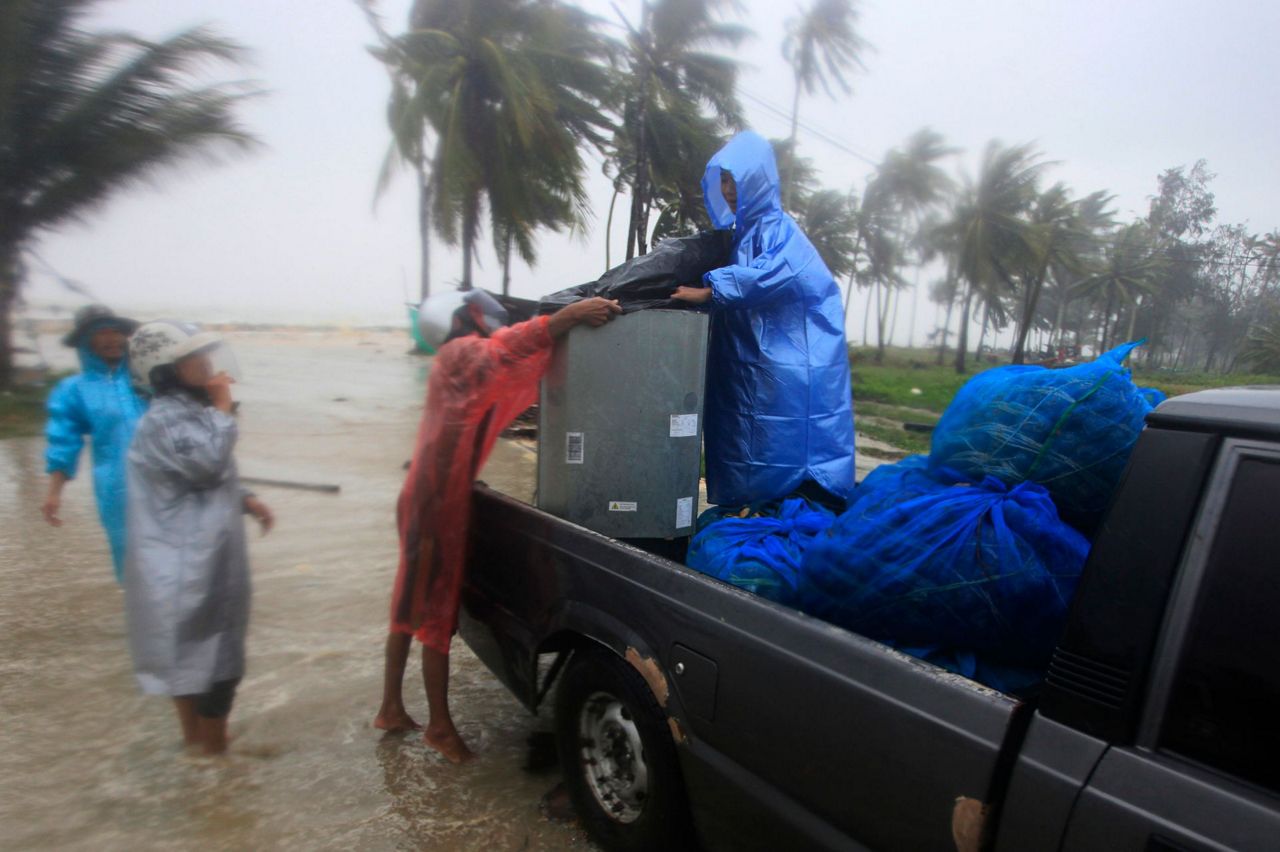 Tropical storm's rain, surging seas strike southern Thailand