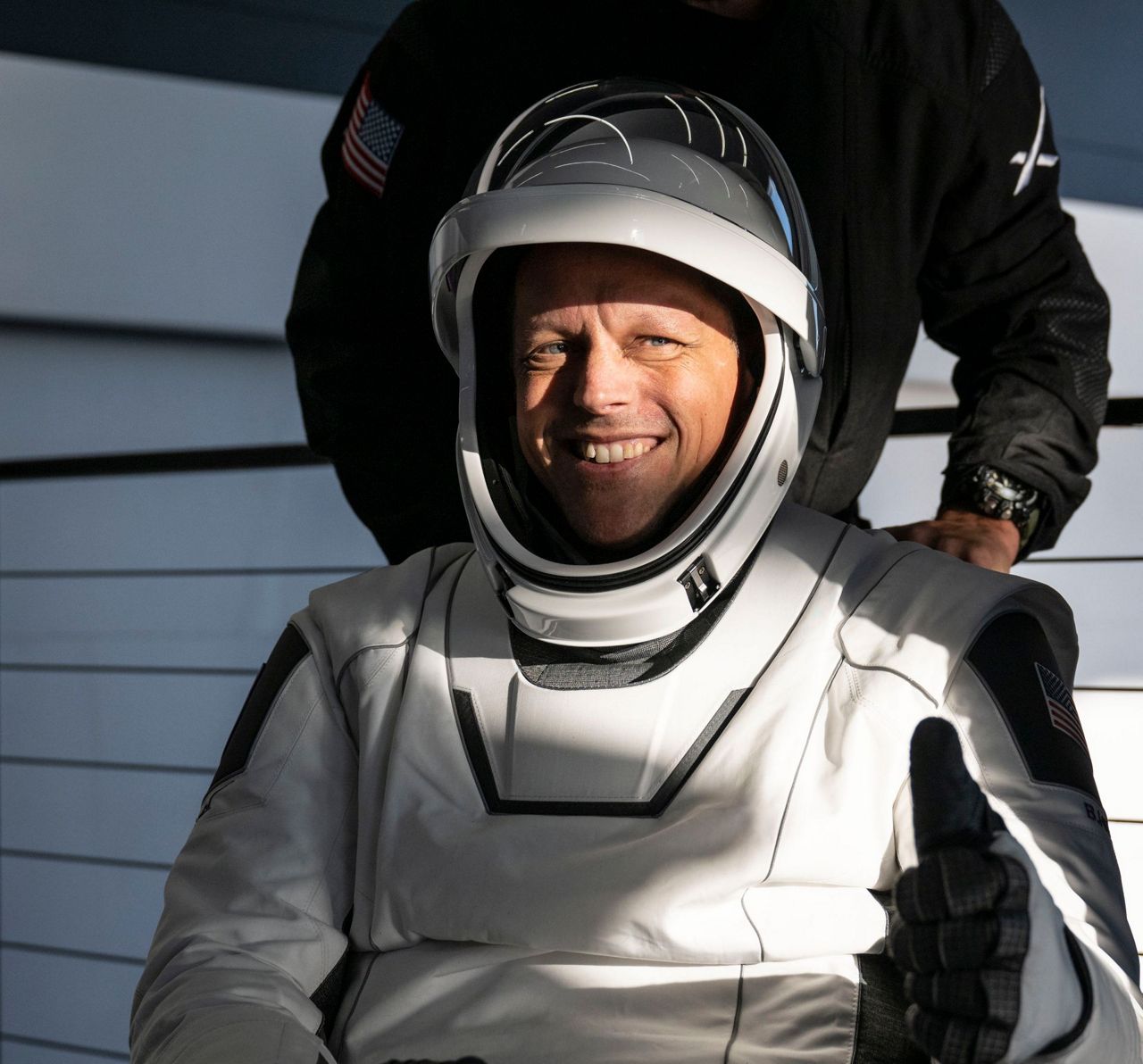 SpaceX ferries astronauts back to Earth after half-year away