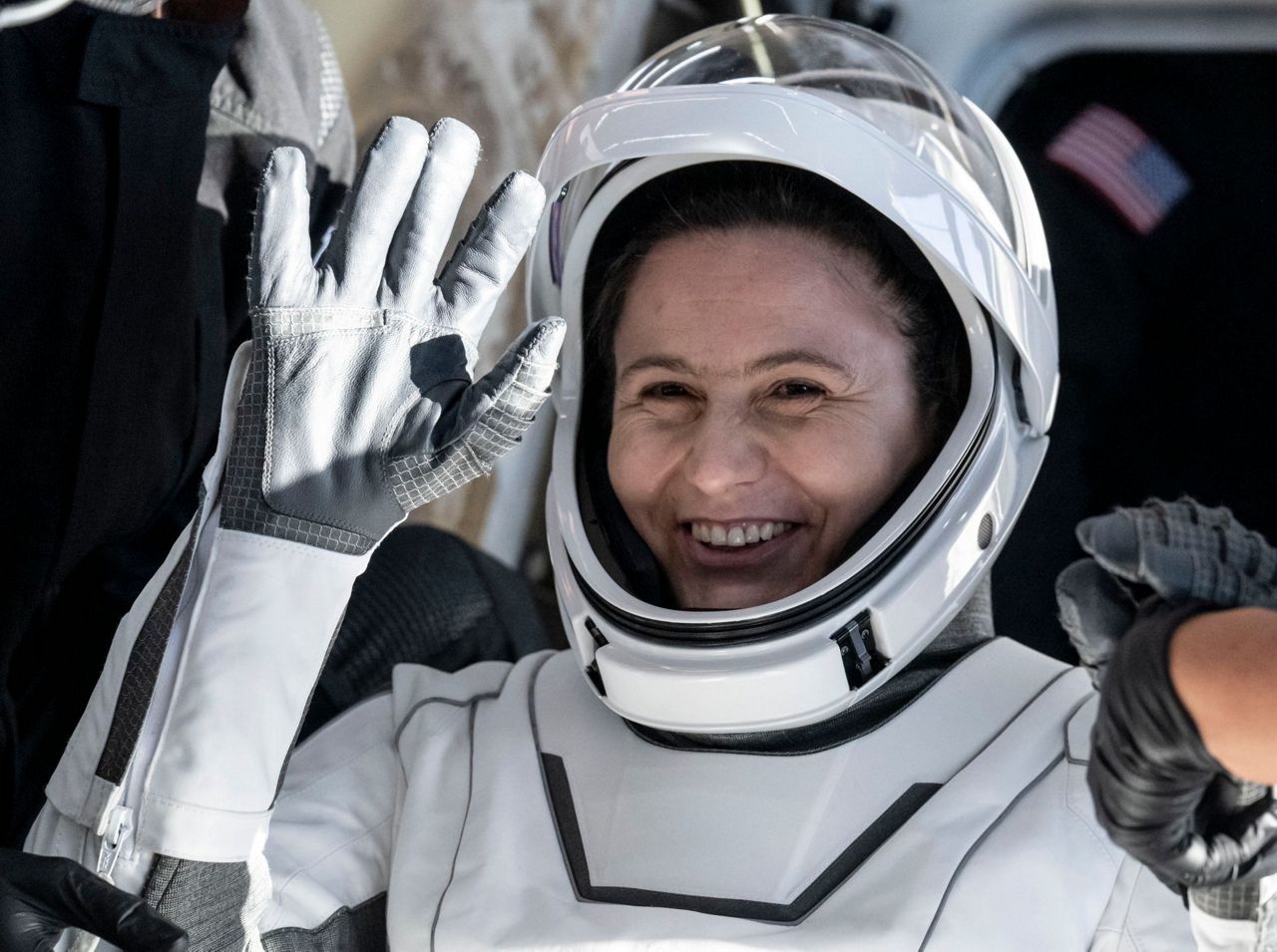 SpaceX ferries astronauts back to Earth after half-year away