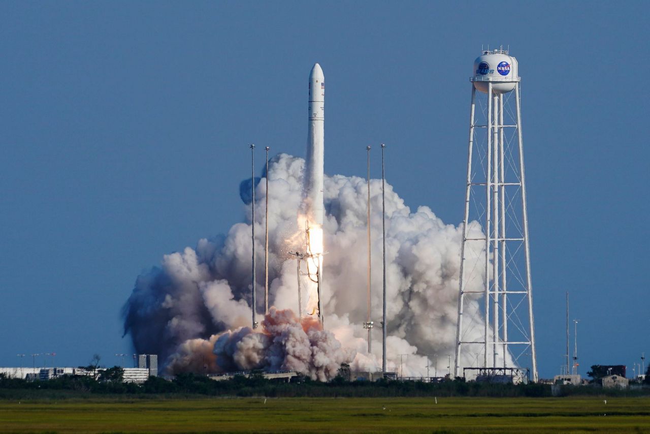 Space station supplies launched with a pizza delivery for 7