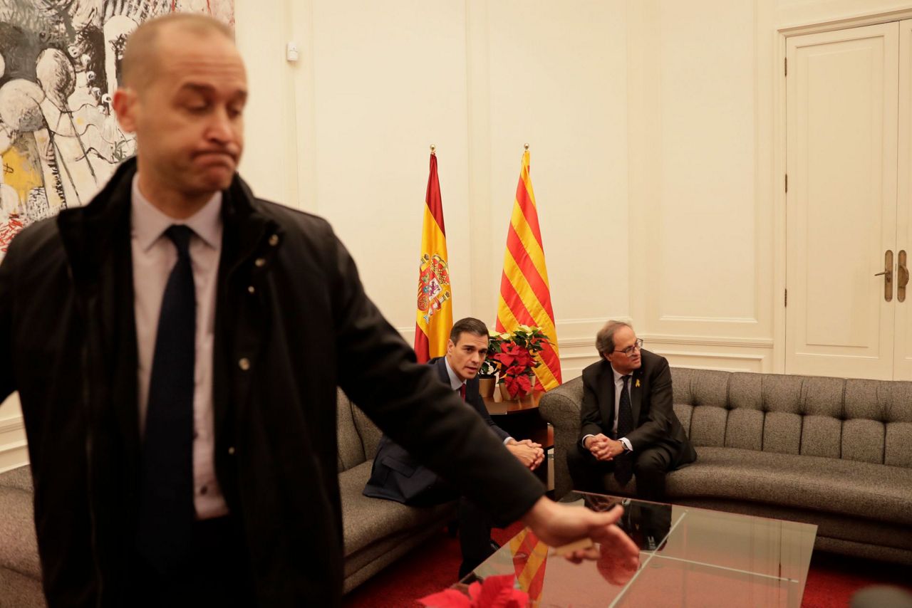 The Latest: Spain's Cabinet arrives at Barcelona palace