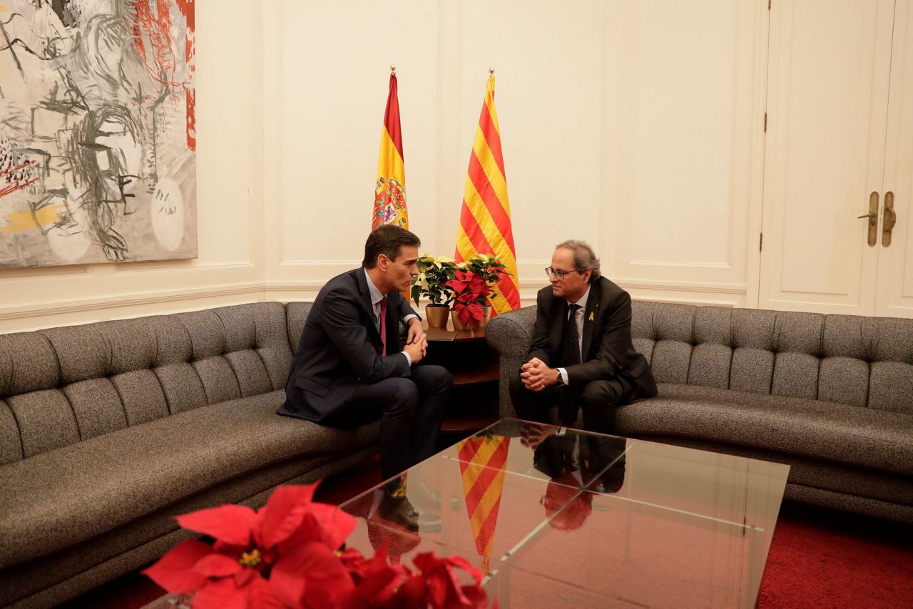 The Latest: Spain's Cabinet arrives at Barcelona palace
