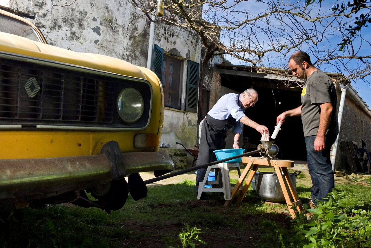 Tradition of open-air pig slaughter abides on Spanish island