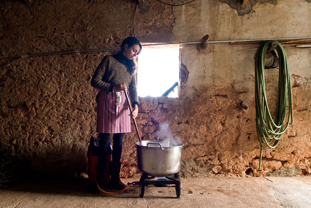 Tradition of open-air pig slaughter abides on Spanish island