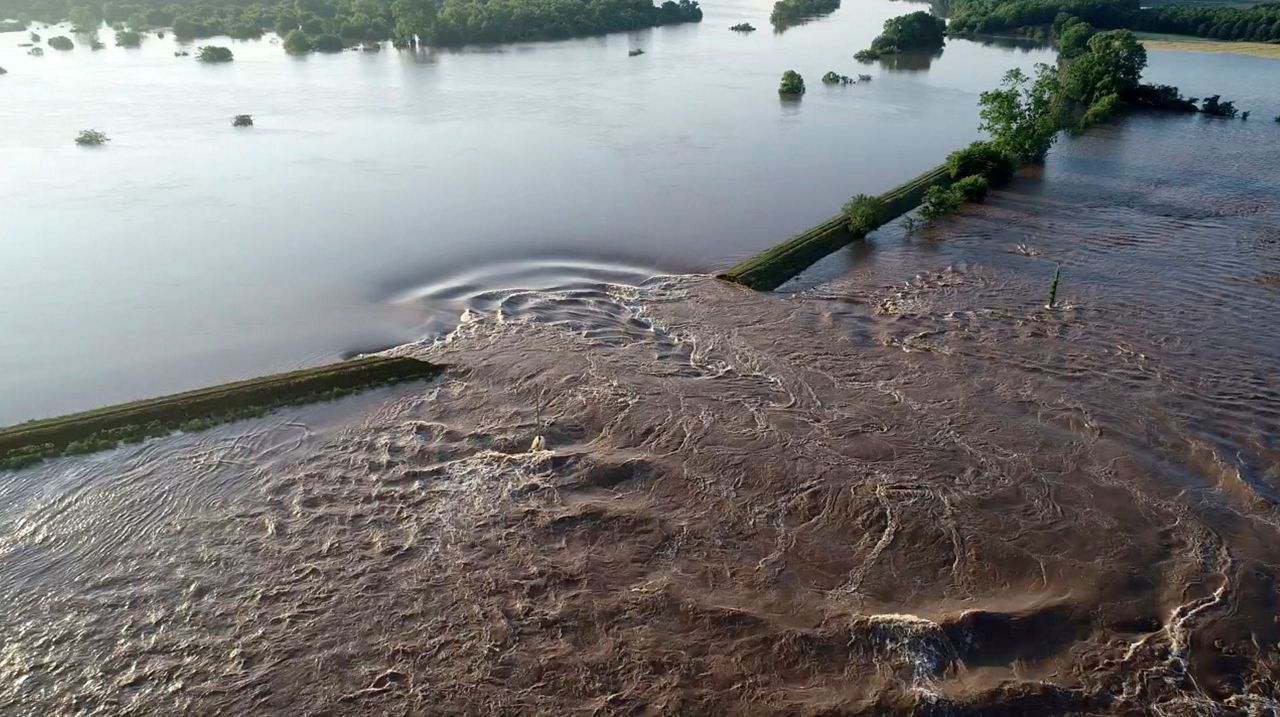 Record flooding causes levee breach in western Arkansas