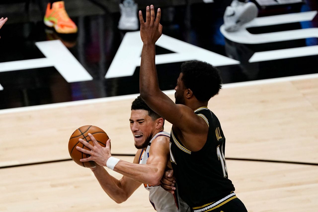 Capela, Hawks pull away late to take 135-103 win over Suns