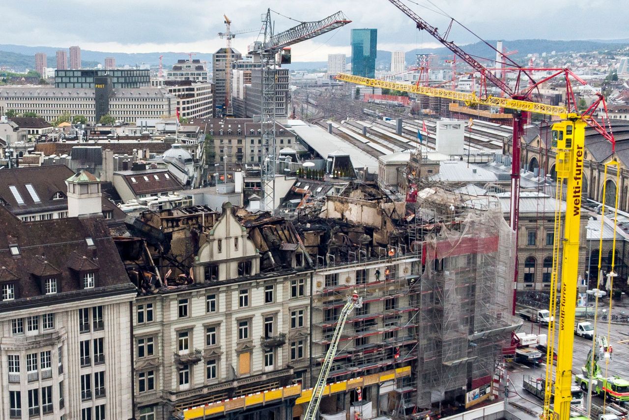 Fire near Zurich's main train station disrupts transport