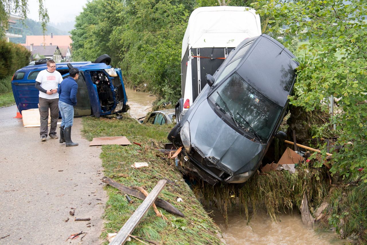 Heavy rains lead to flooded roads in Switzerland