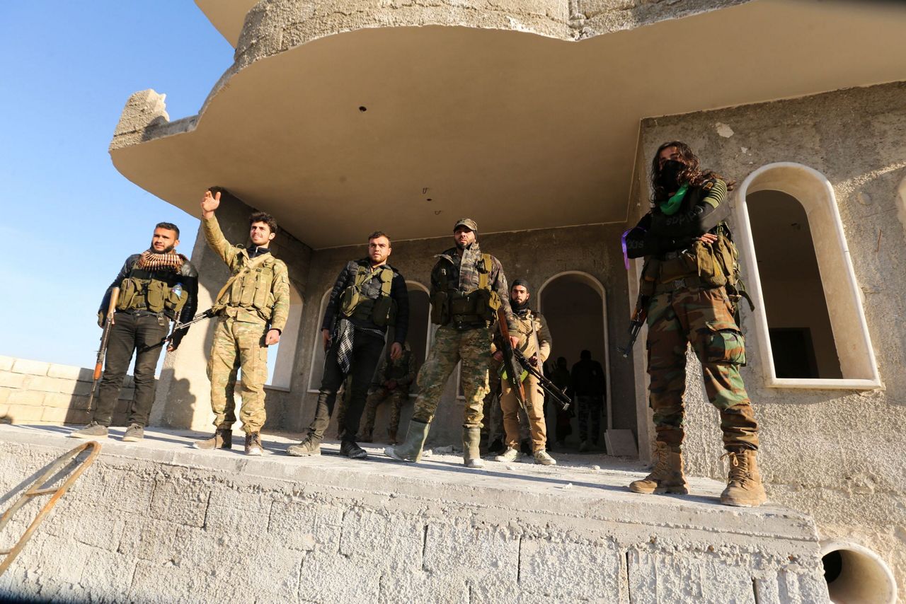 Syrian opposition fighters retake key town from government