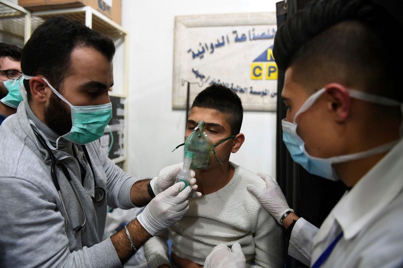 Syrian officials: More than 100 wounded in chemical attack