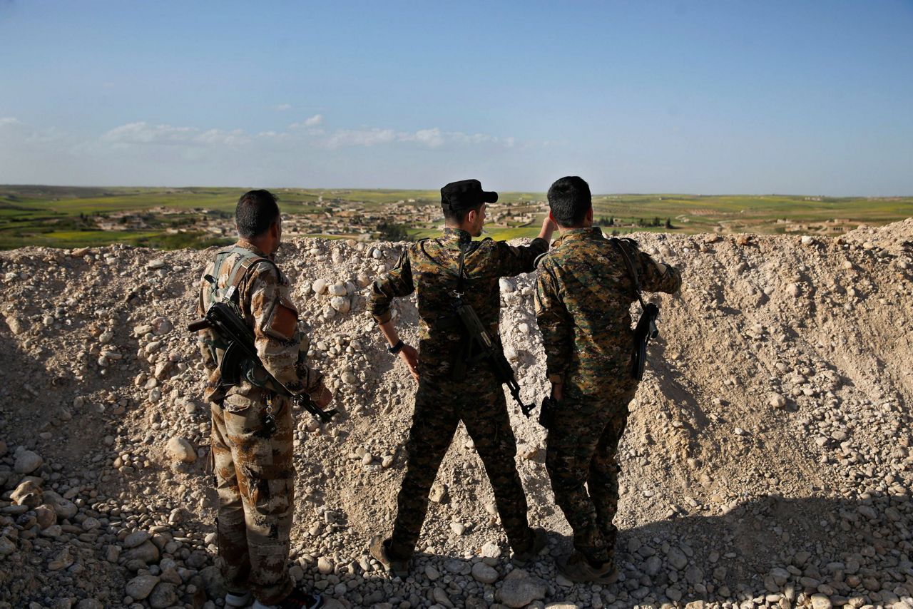 Syrian Kurds to pull out of key town, easing US-Turkey rift