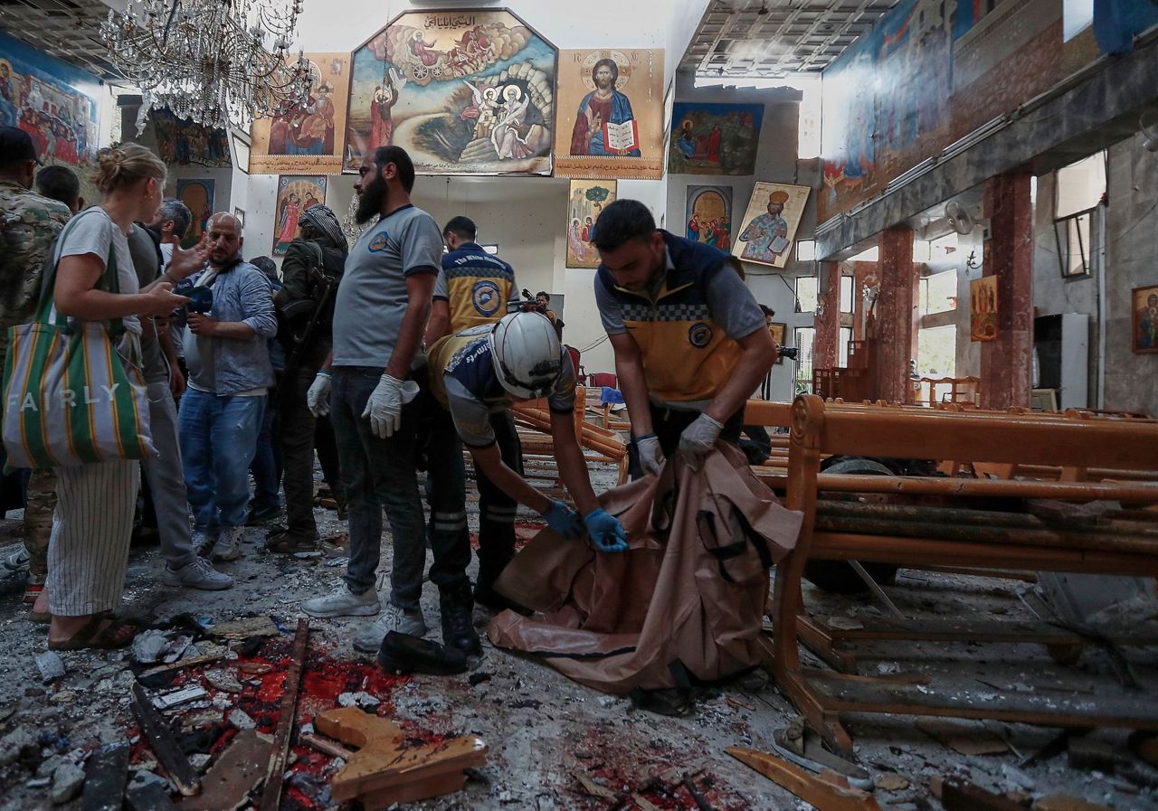 Mideast governments condemn Syria church bombing as death toll jumps to 25