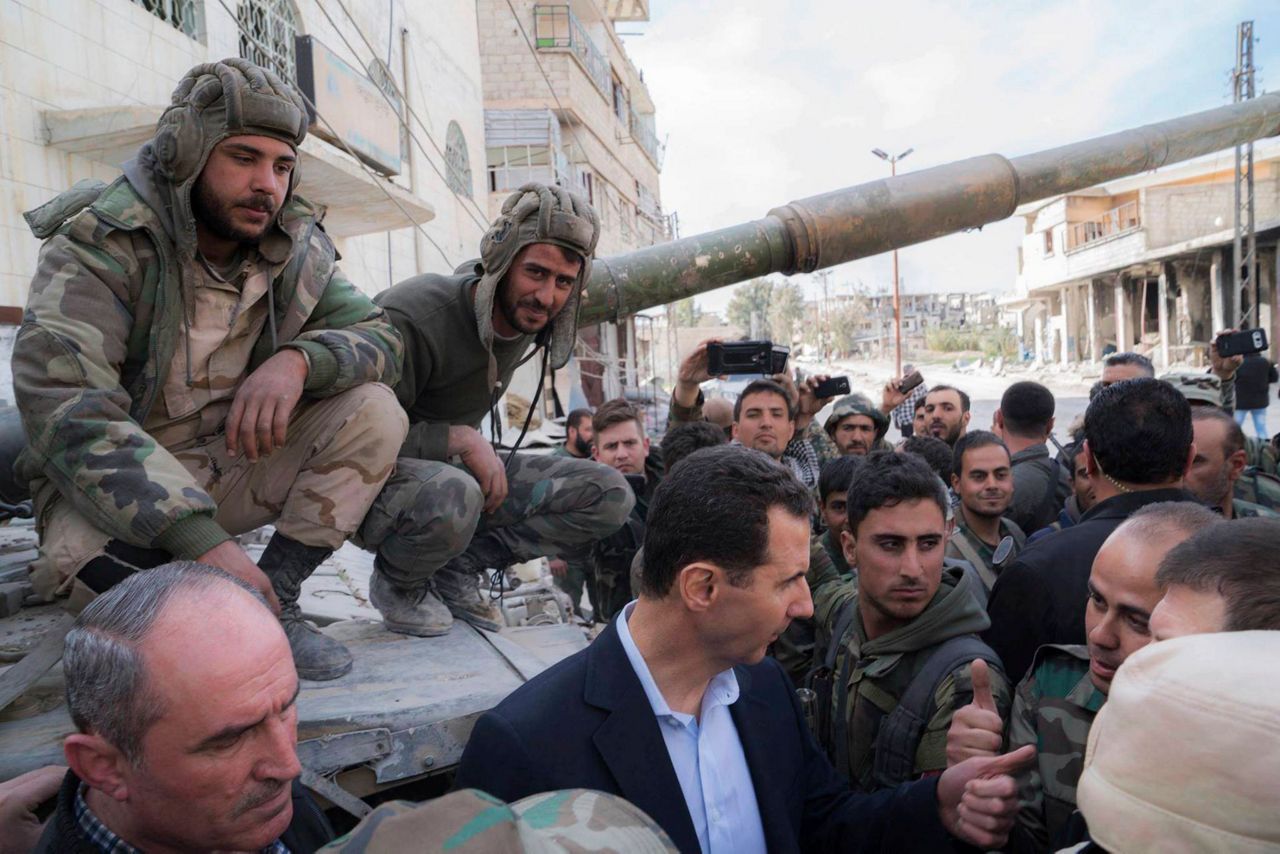 Syria's Assad gets a prize with US withdrawal, Russia deal