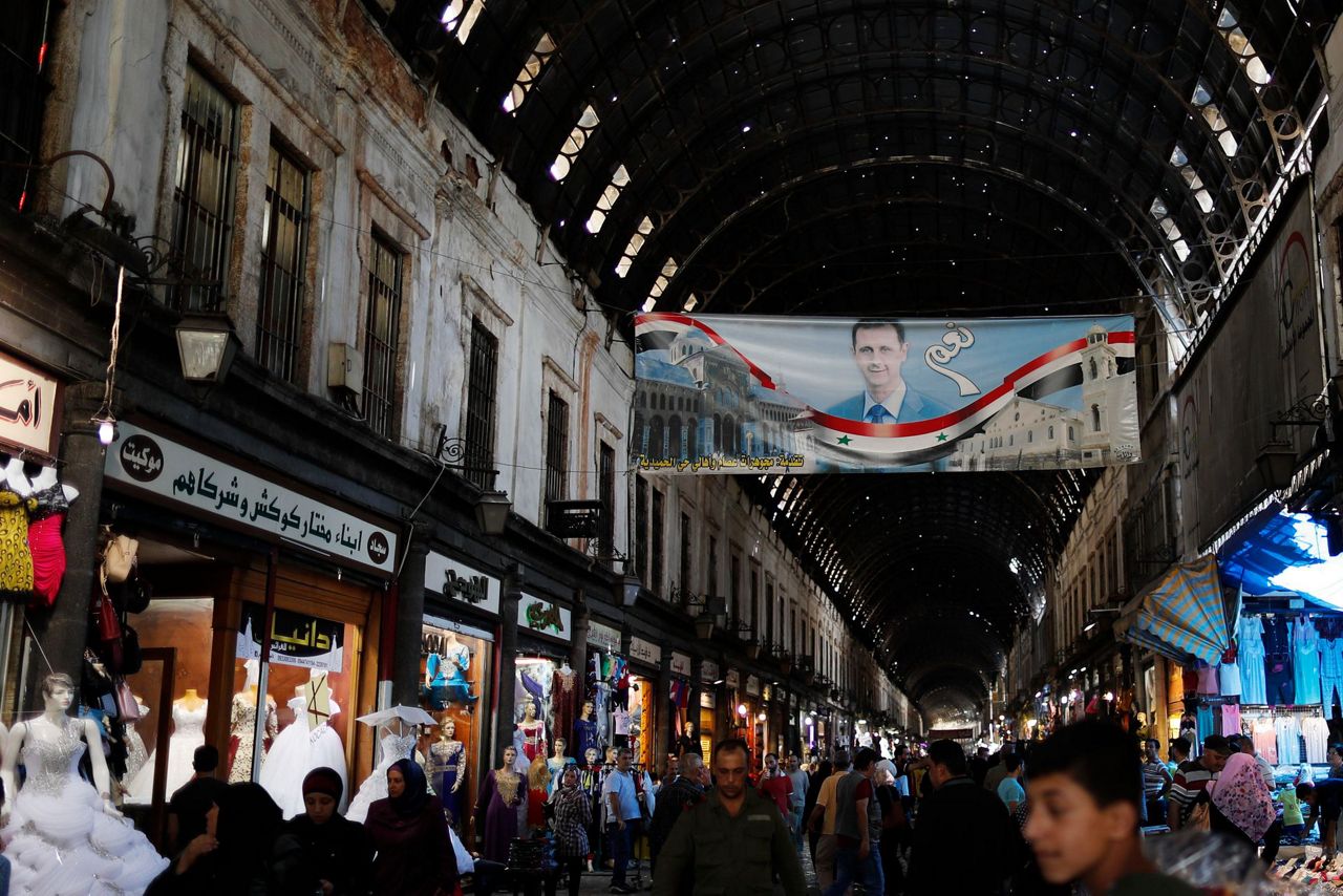 AP PHOTOS: Assad's victory posters crowd Damascus streets