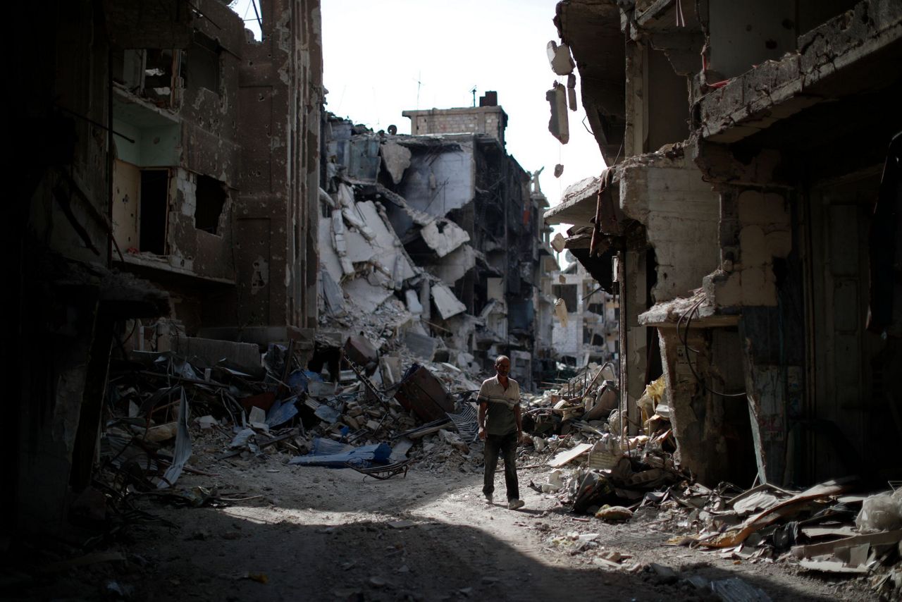 AP PHOTOS: Clearing the rubble in Syria's Yarmouk camp