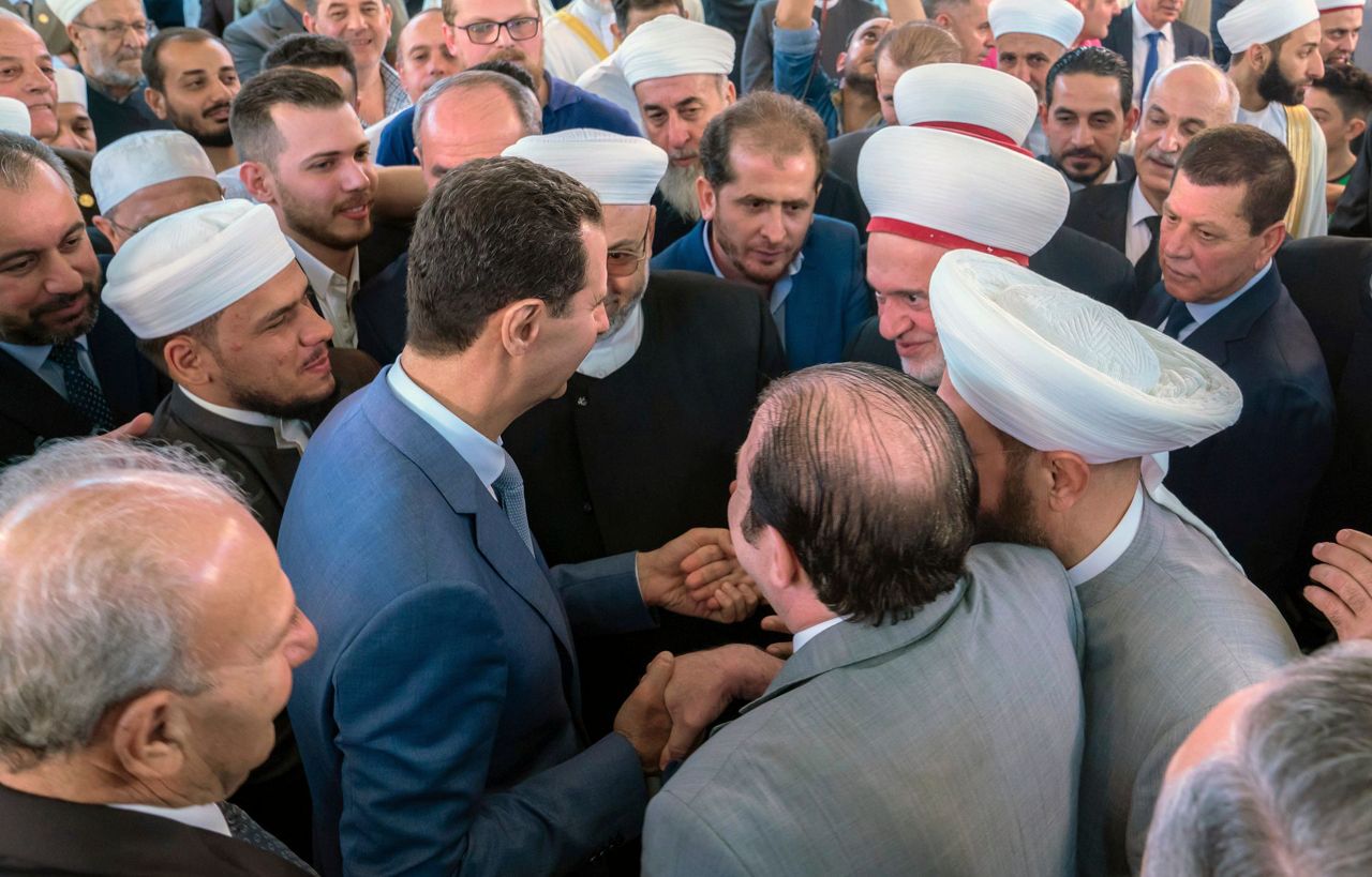 Syria's Assad attends holiday prayers in Damascus mosque