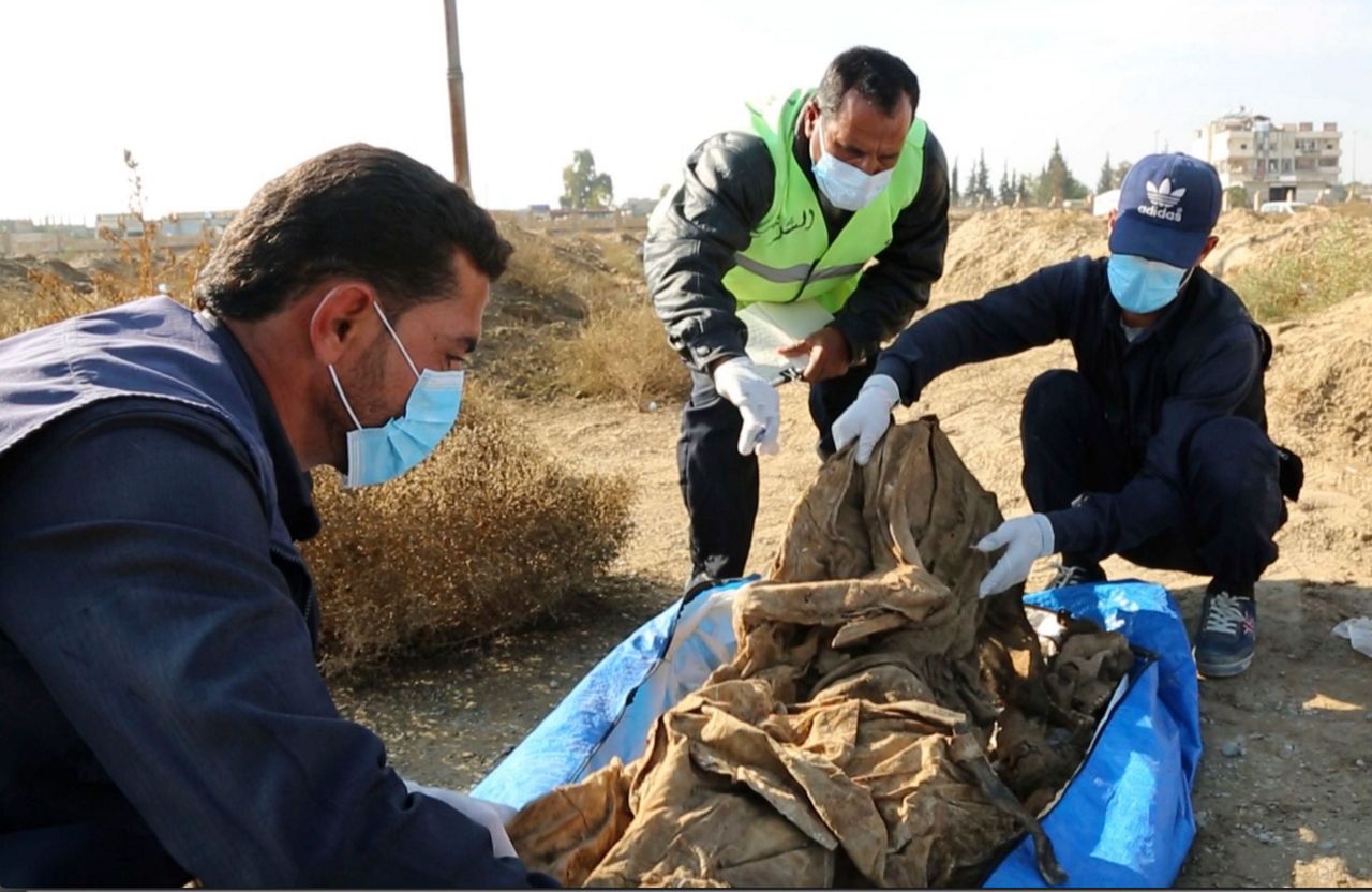 Hundreds of bodies exhumed from mass grave in Syria's Raqqa