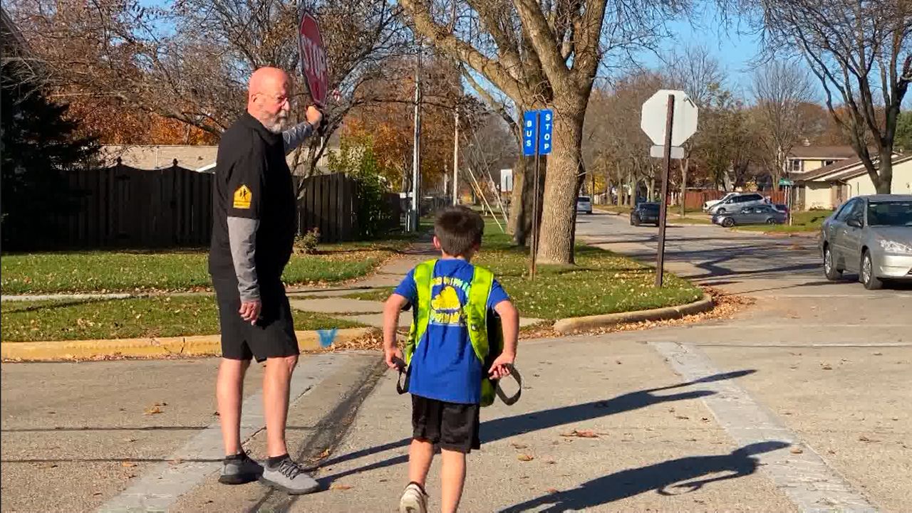 Crossing guard reunites lost children with family