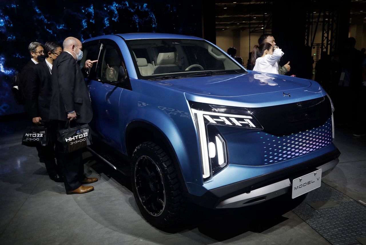 Smartphone maker Foxconn unveils EV for Taiwan brand Yulon