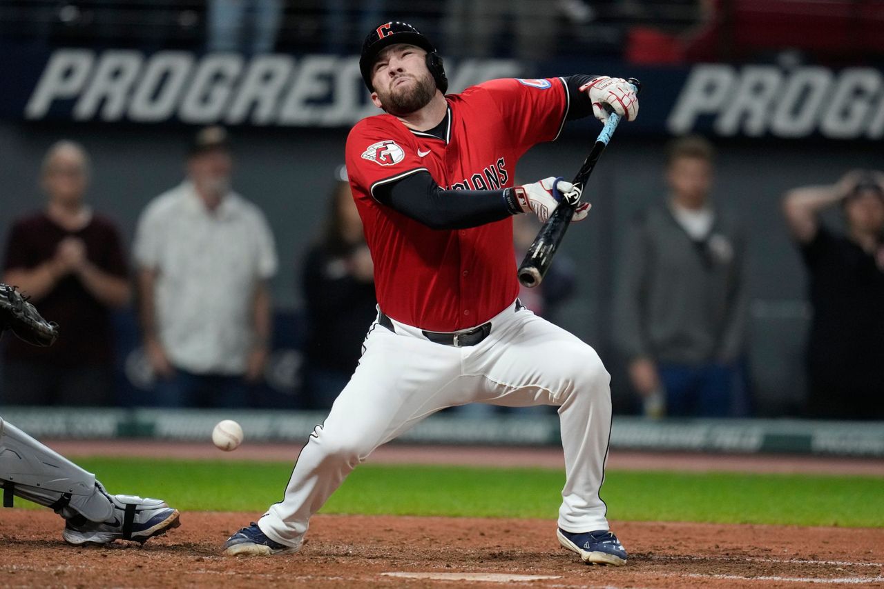 Guardians' David Fry carted off field after being hit in face by pitch ...