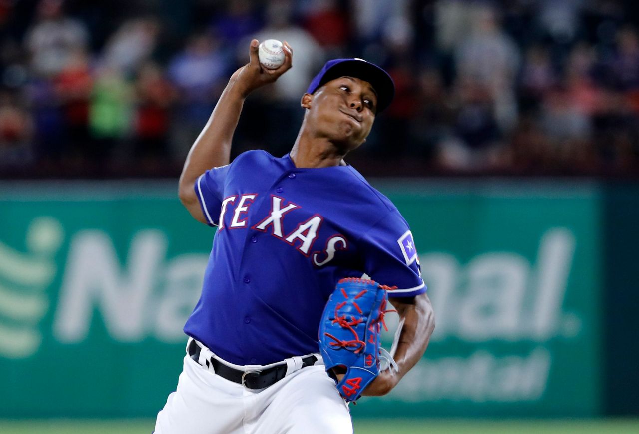 Rangers reliever Leclerc throws ball onto roof, tops Tigers