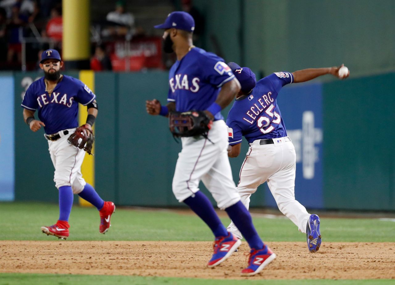 Rangers reliever Leclerc throws ball onto roof, tops Tigers