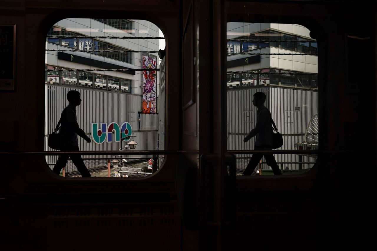 AP Photos: In the loop: Tokyo from a commuter train line