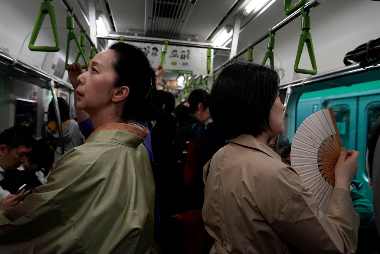 AP Photos: In the loop: Tokyo from a commuter train line
