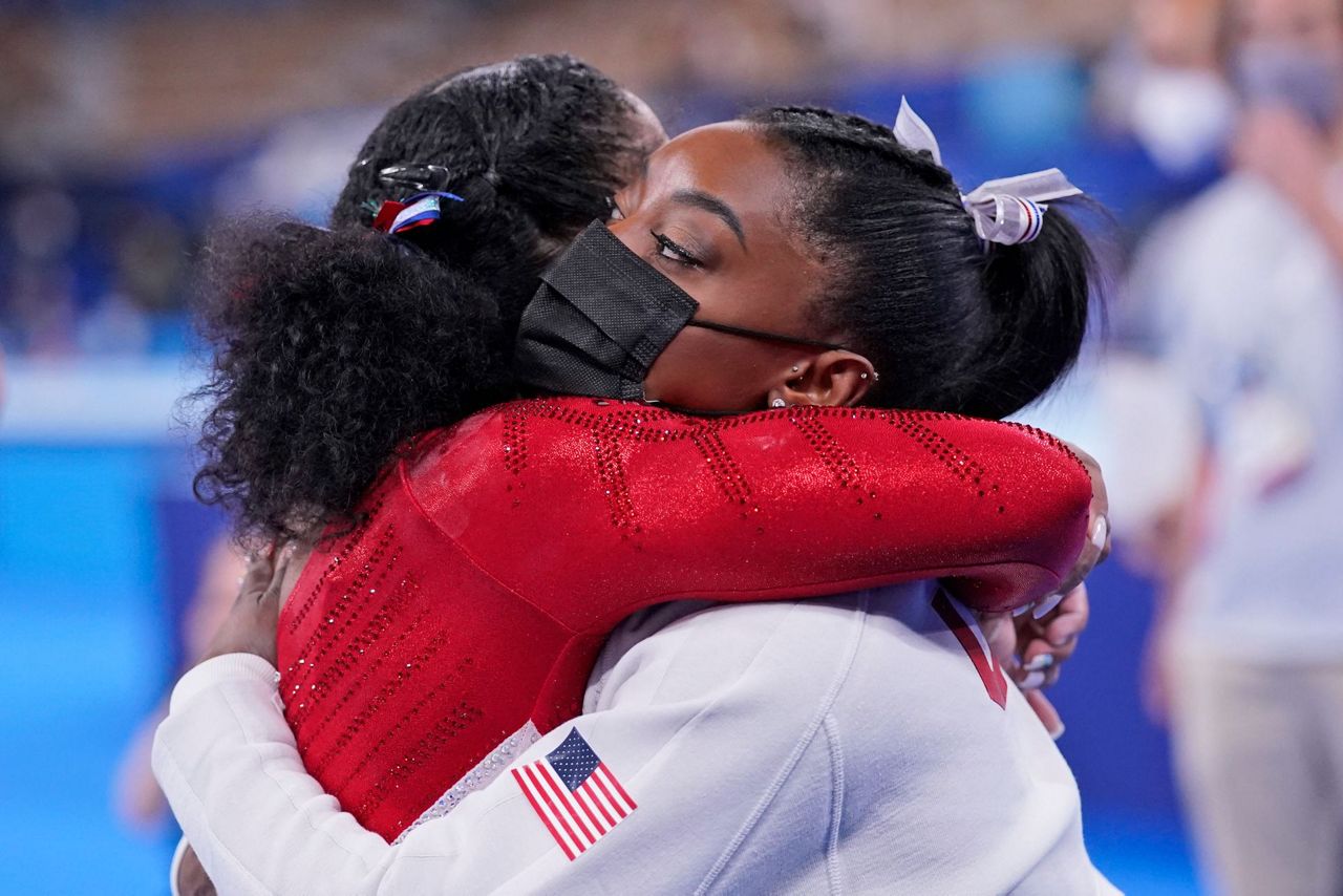 Olympic champ Biles out of team finals with apparent injury