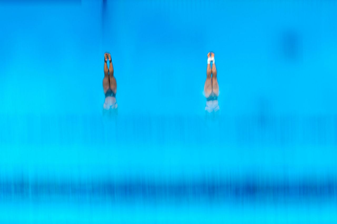 EXPLAINER: Olympic photos from far above — and underwater