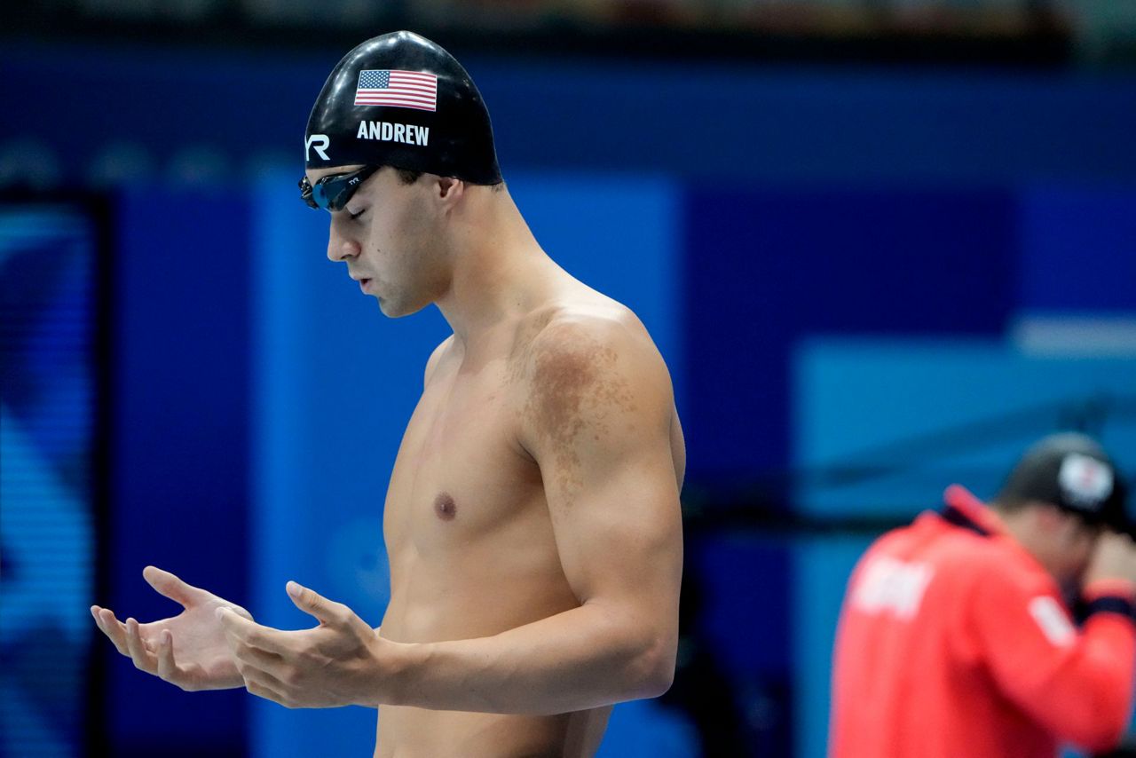 US swimmer Andrew goes maskless behind scenes at Olympics