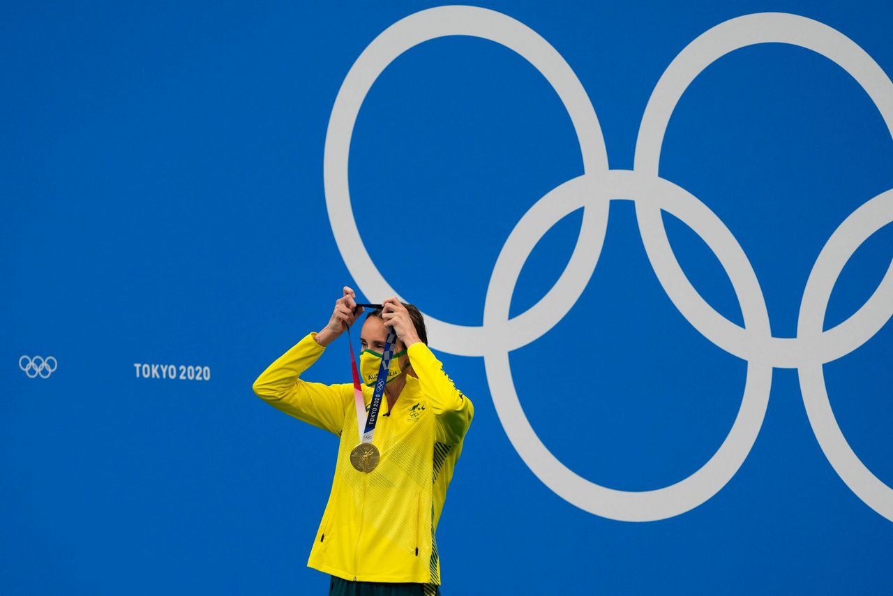 Milestone medals in pool, 100-meter dash on tap at Olympics