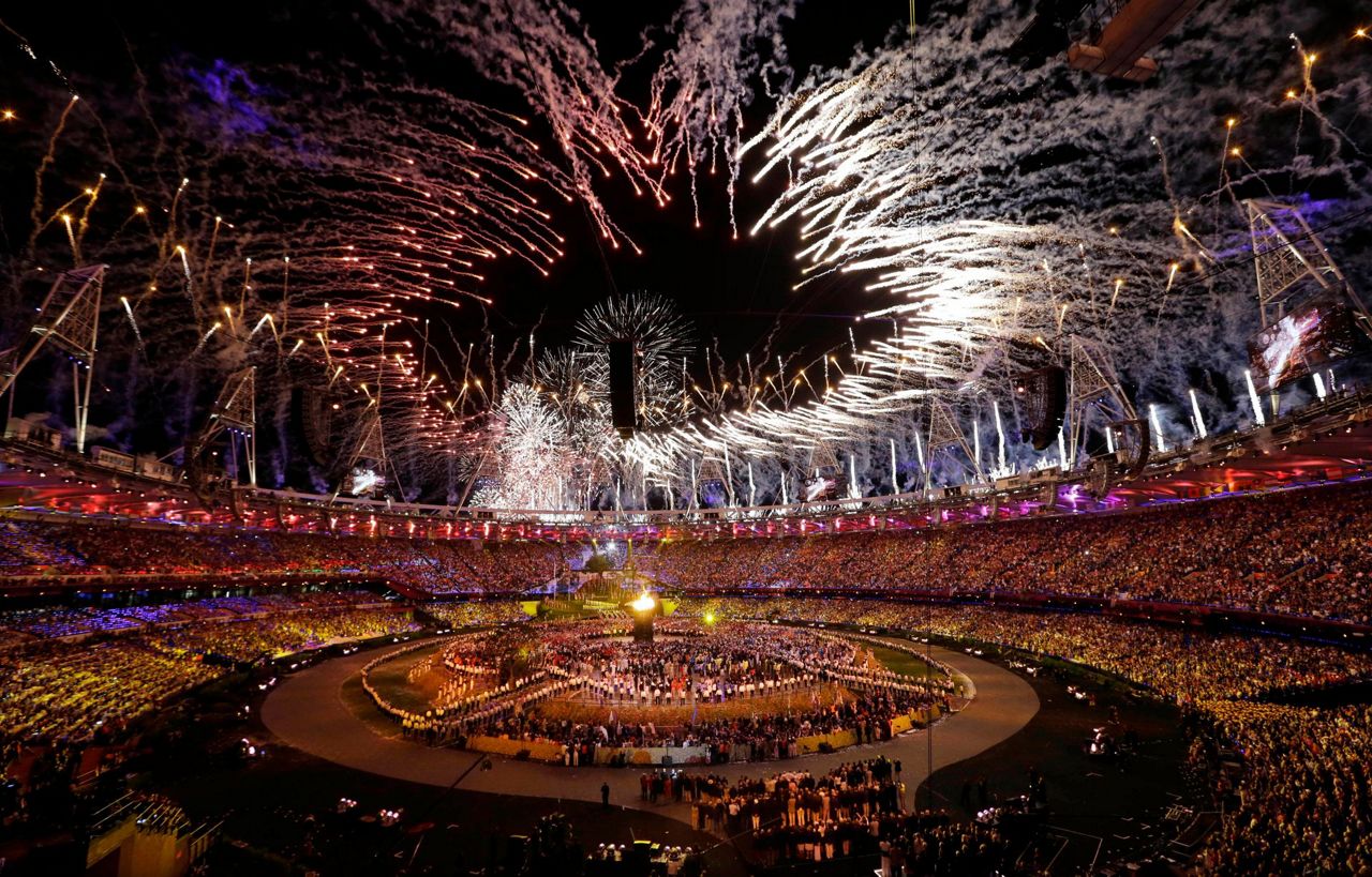 AP PHOTOS: Nearly 100 years of lighting the Olympic flame
