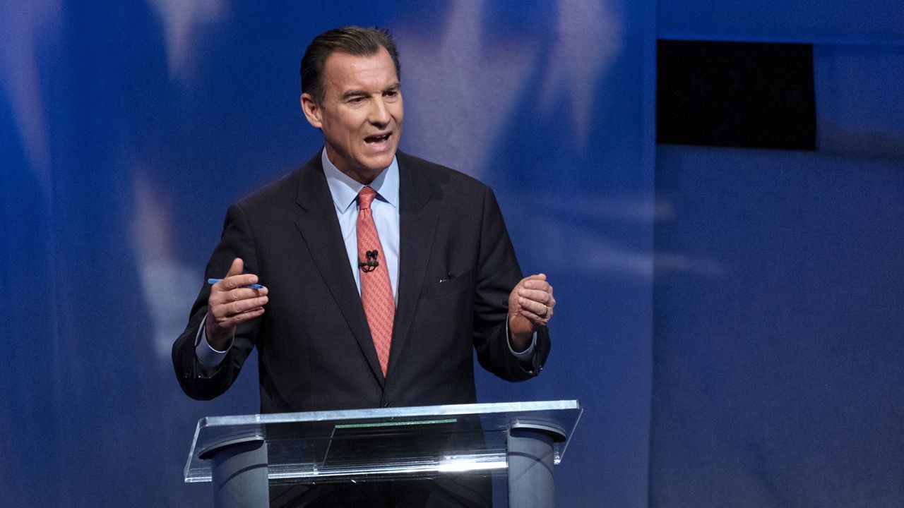 Tom Suozzi wants to retake seat as Santos' legal woes mount