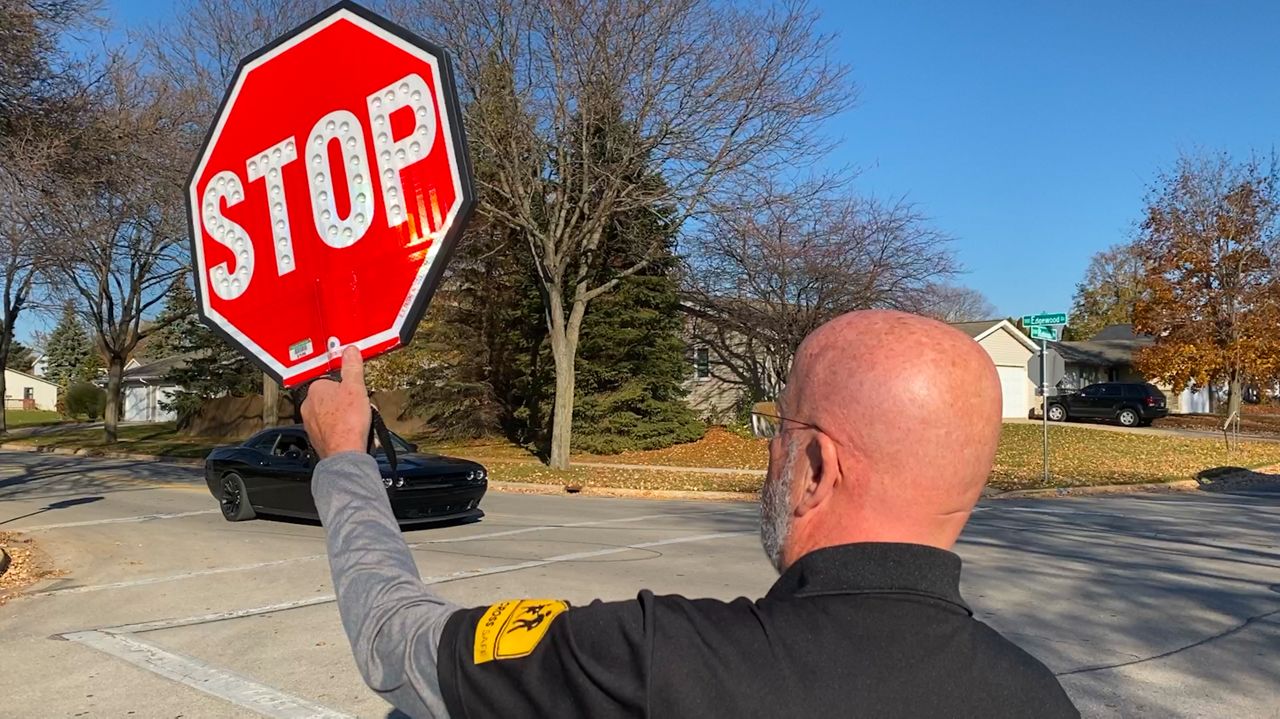 Crossing guard reunites lost children with family