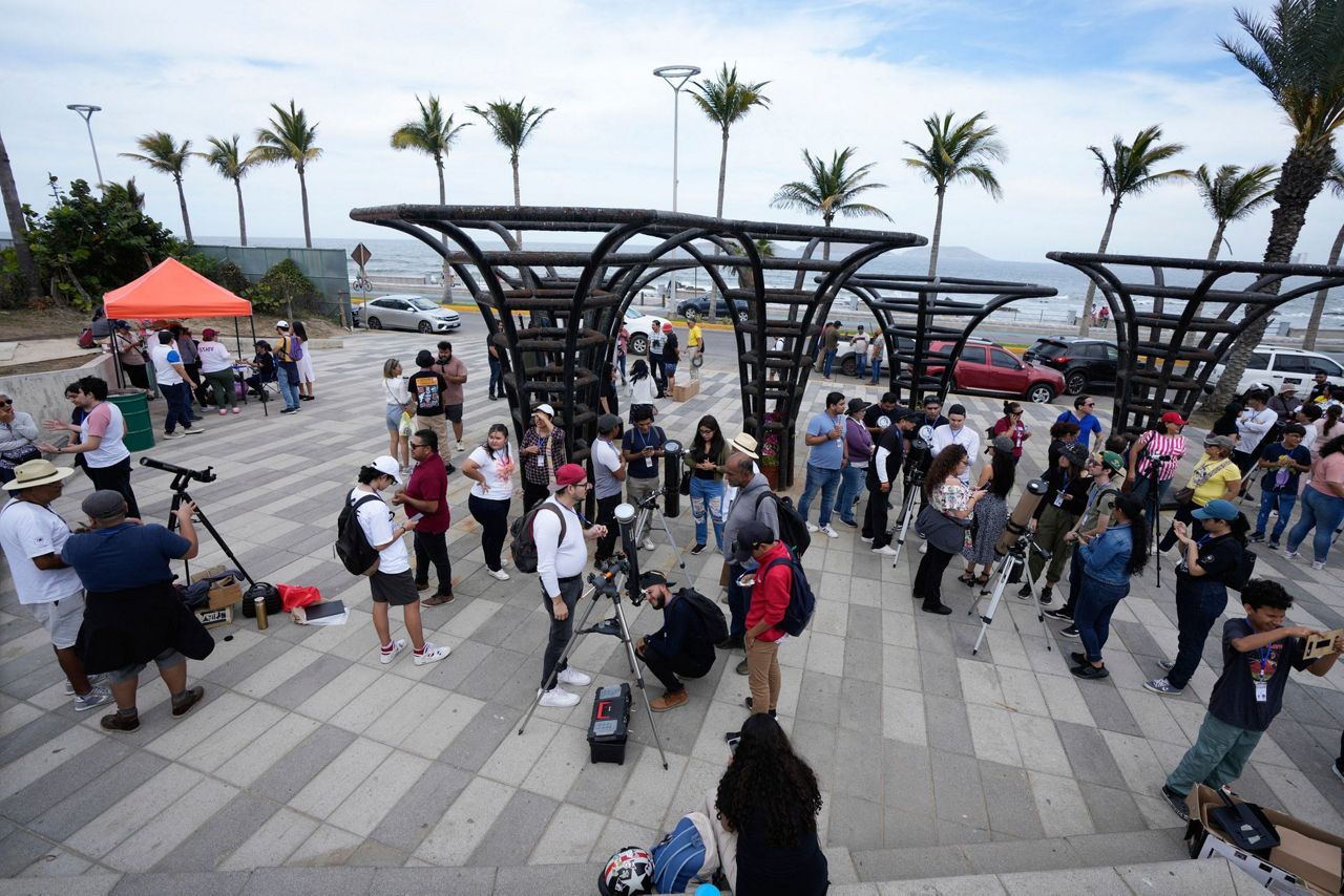 Weather is the hot topic as eclipse spectators stake out their spots in ...