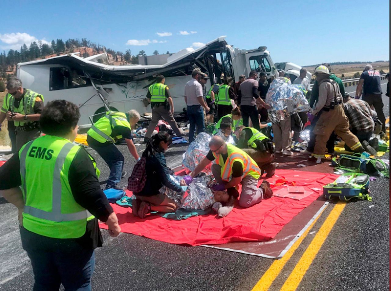 Officials: Tour bus crash near national park in Utah kills 4