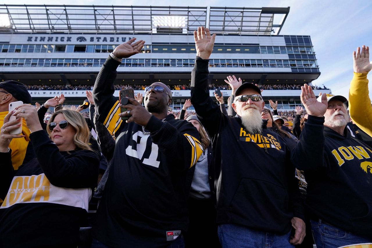College football traditions: 'Hawkeye Wave' bonds everyone in stadium ...