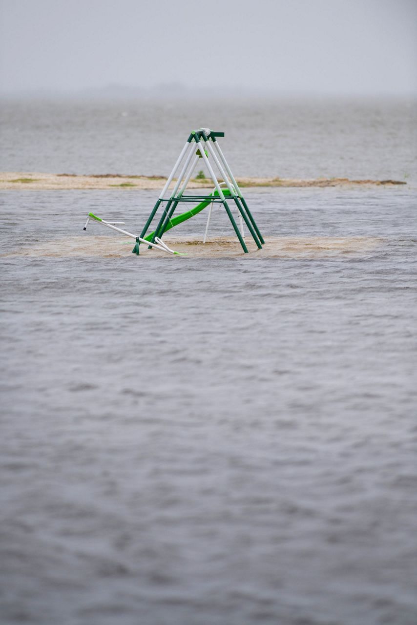 The Latest: Sally's rains pummel western Florida Panhandle