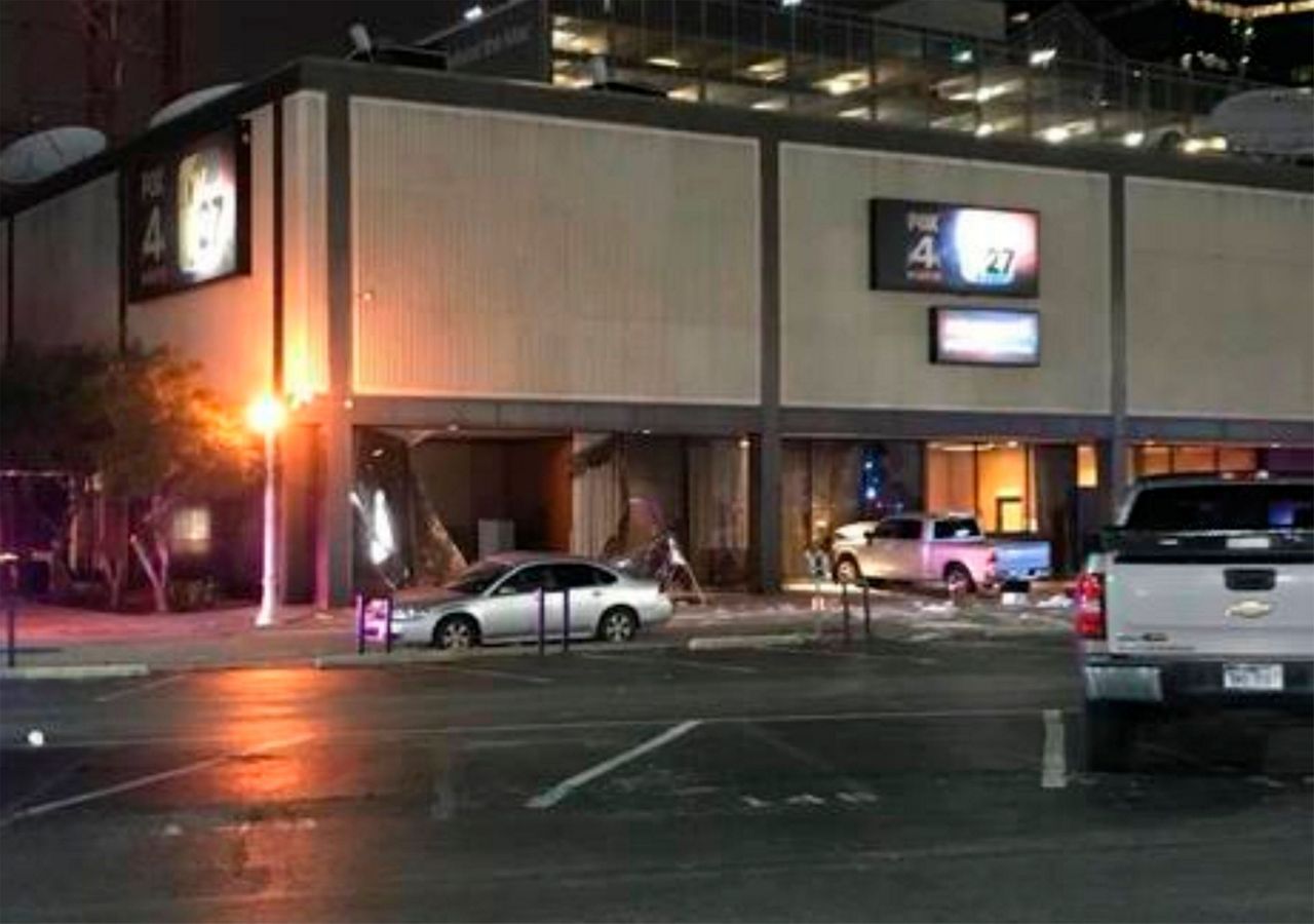 Police detain man who crashed truck into Dallas TV station