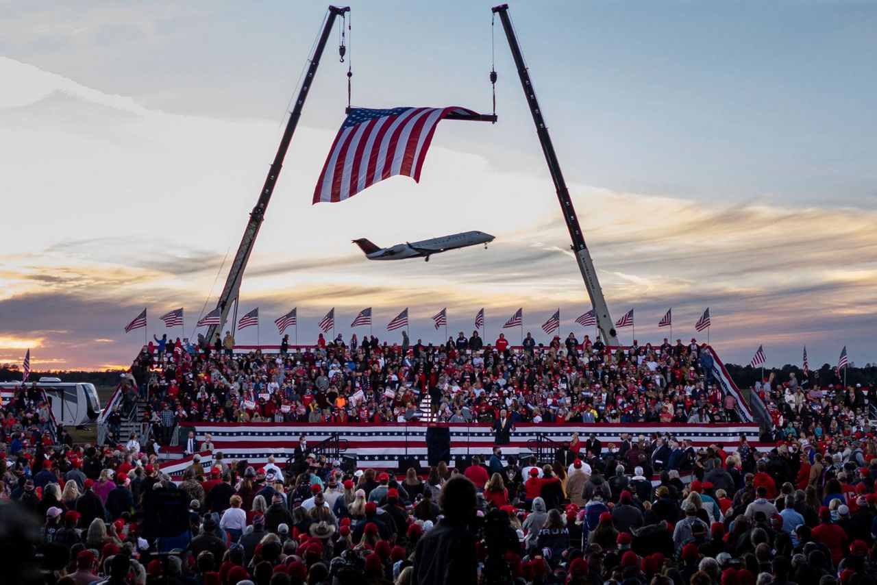 At Georgia Senate rally, Trump can help his party or himself
