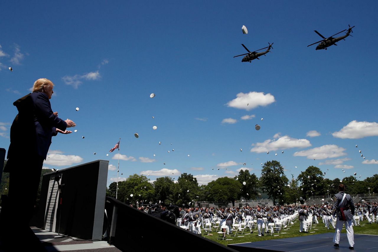 Trump addresses West Point grads amid tension with military