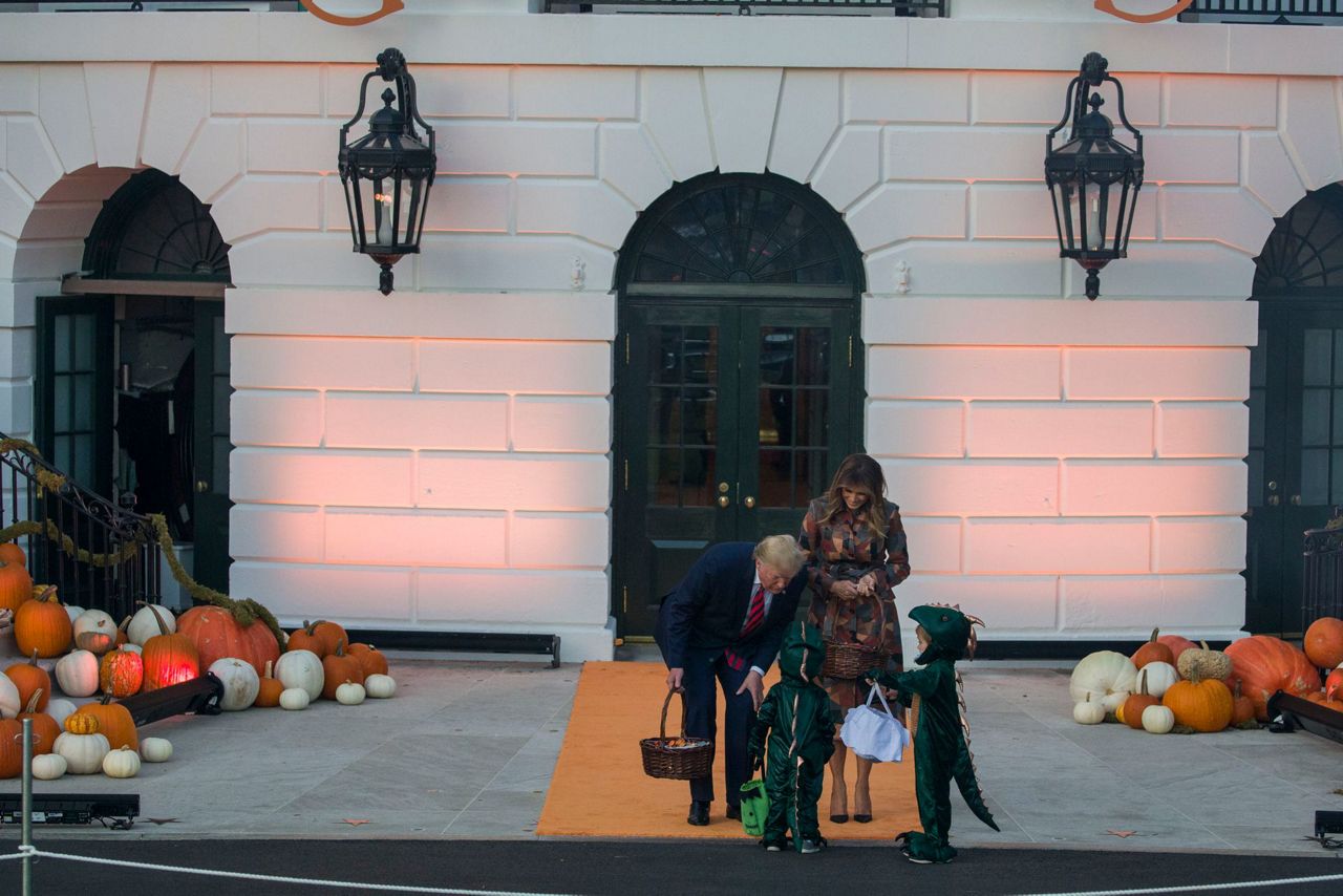 Trumps hand out Halloween candy, greet kids at White House