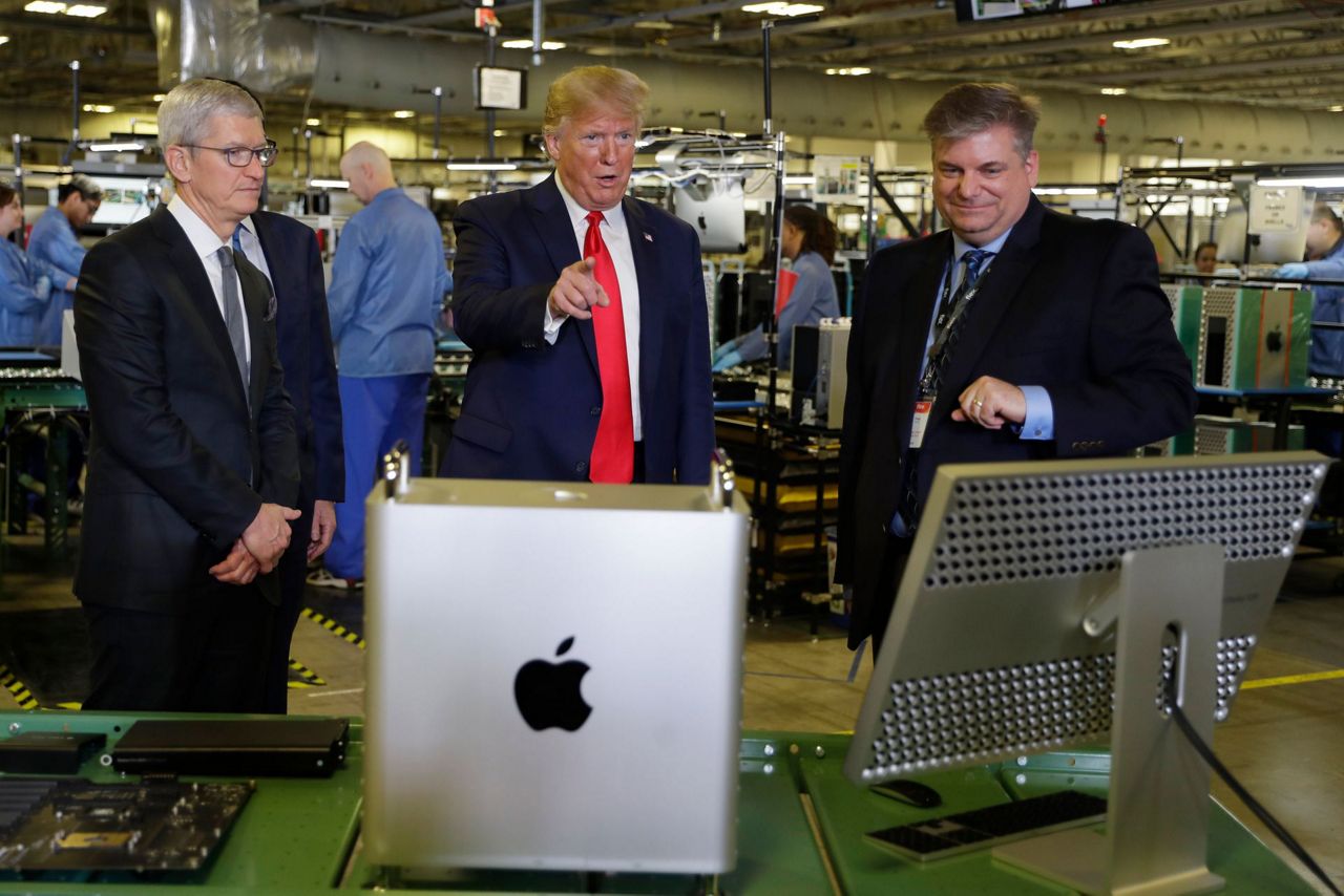 Escaping impeachment, Trump to showcase Apple plant in Texas