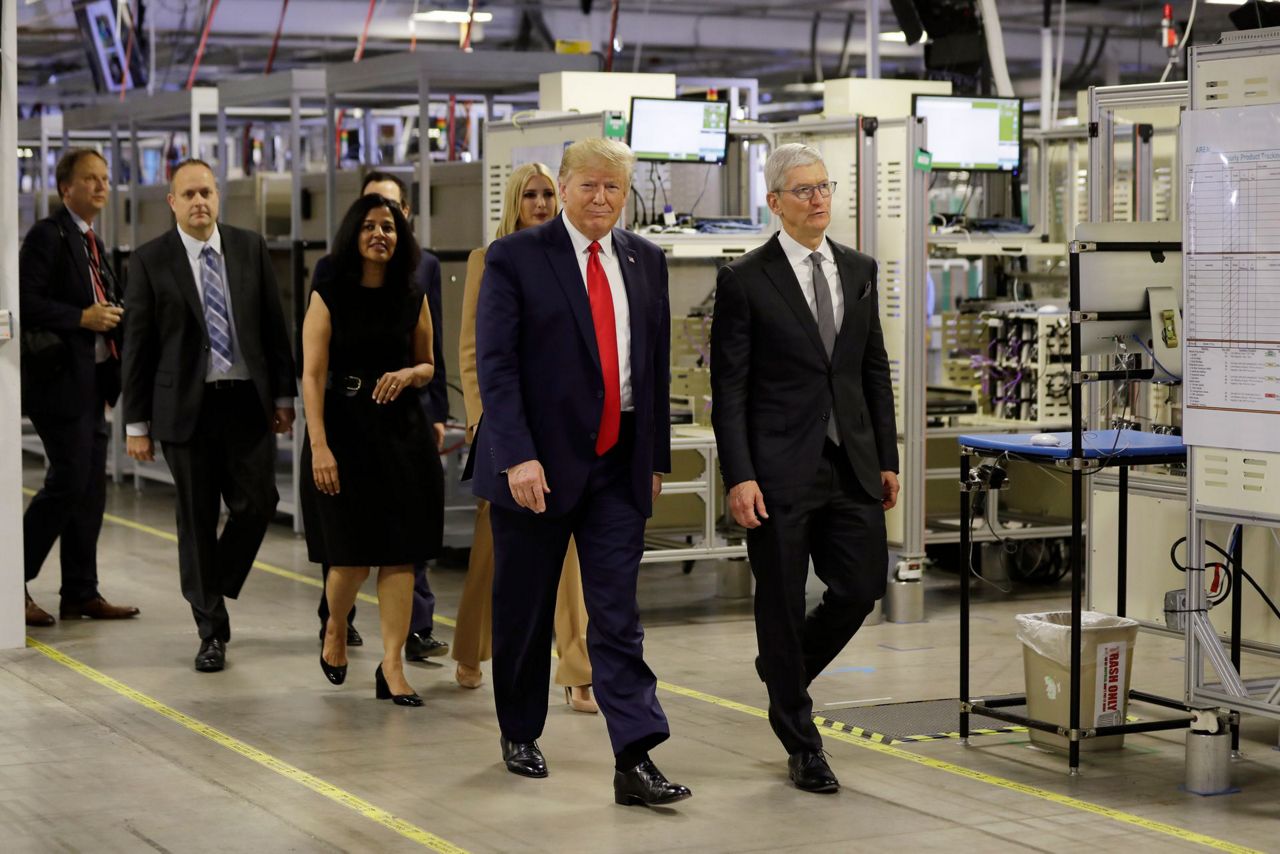 Escaping impeachment, Trump to showcase Apple plant in Texas